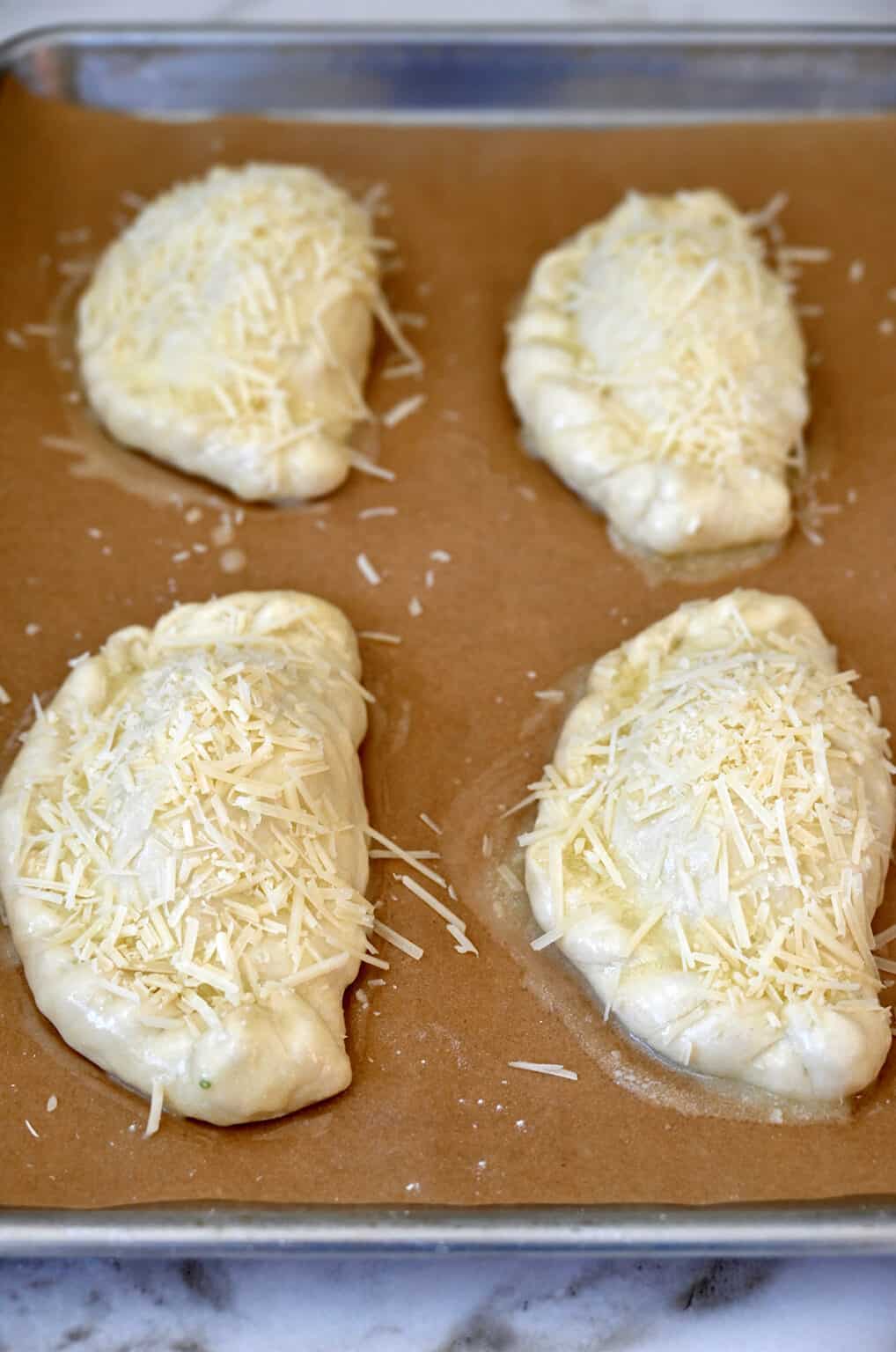 Cheesy Garlic Chicken Calzones - Just a Taste