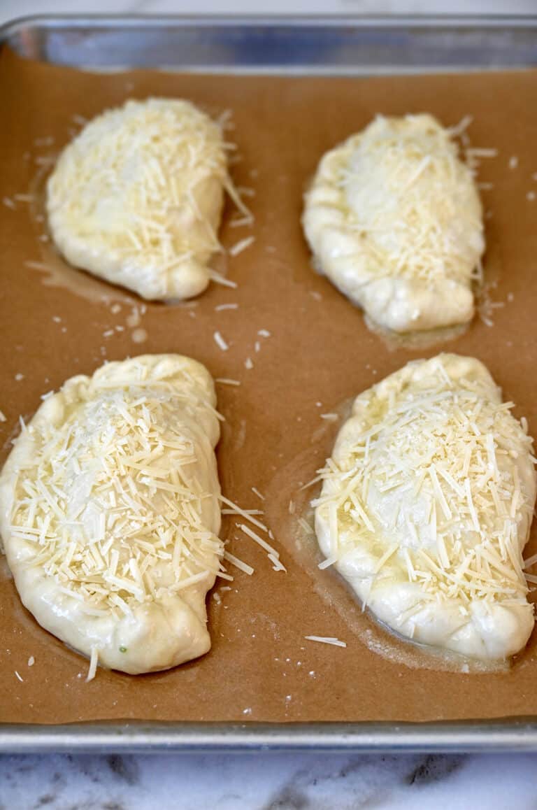 Cheesy Garlic Chicken Calzones - Just a Taste